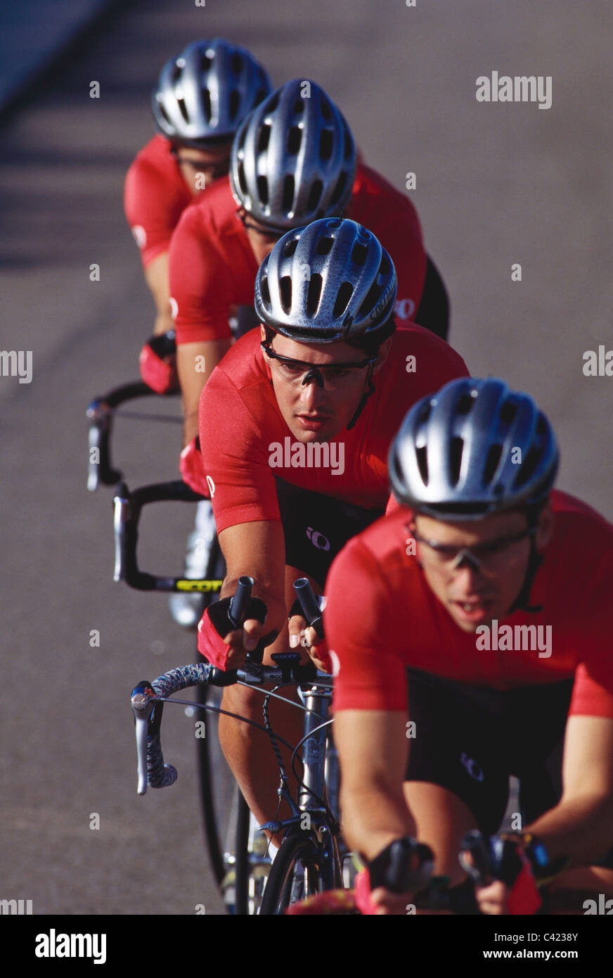 Road cycling team in action Stock Photo - Alamy