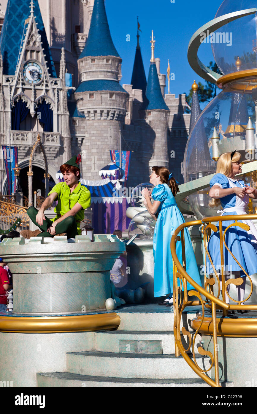 Disney characters ride a float in A Dream Come True parade at the Magic ...
