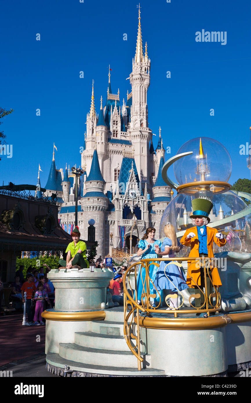 Disney characters ride a float in A Dream Come True parade at the Magic ...