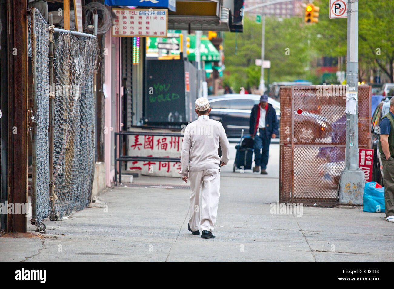 Muslim man walking hi-res stock photography and images - Alamy