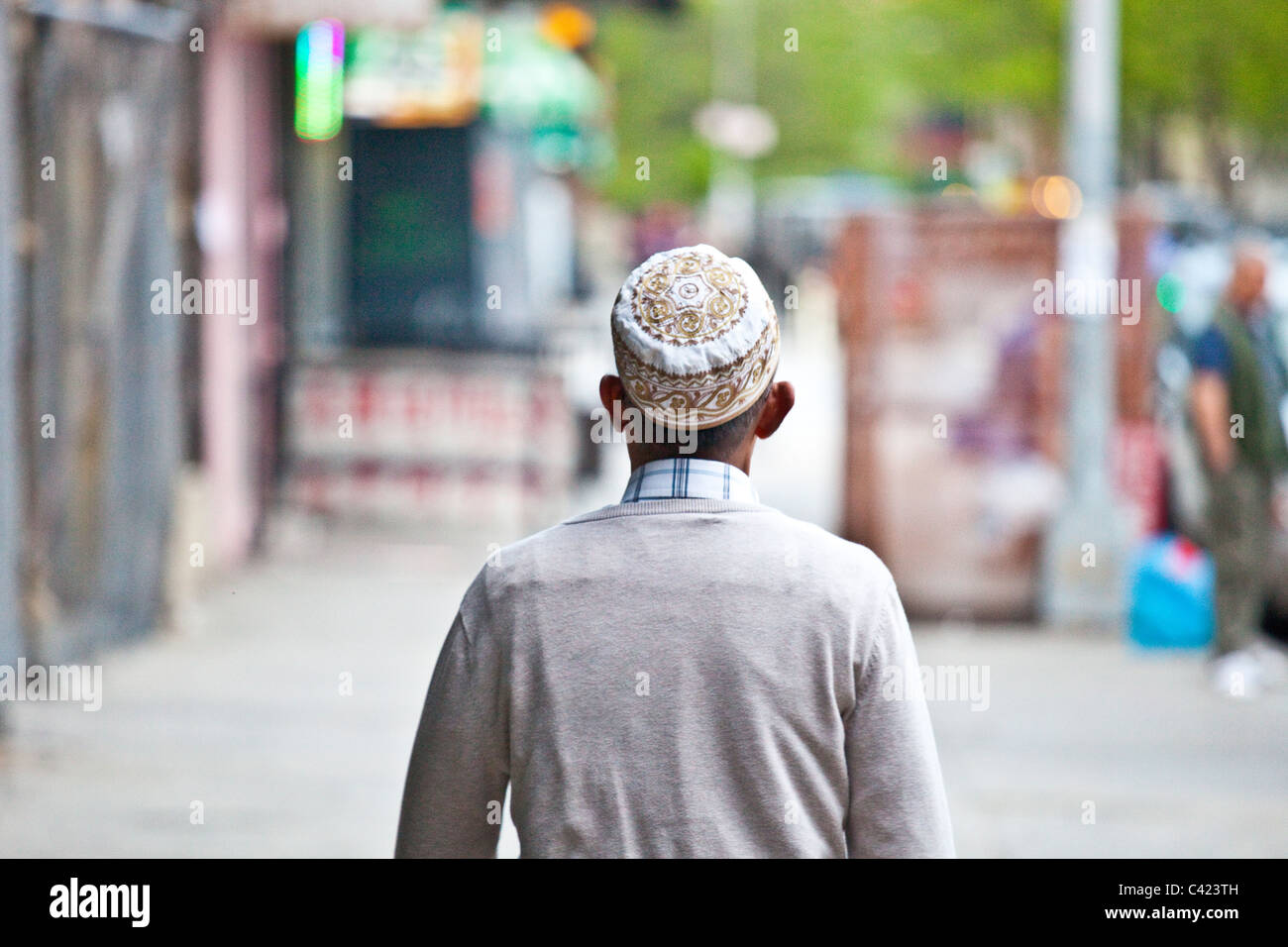 Muslim man walking hi-res stock photography and images - Alamy