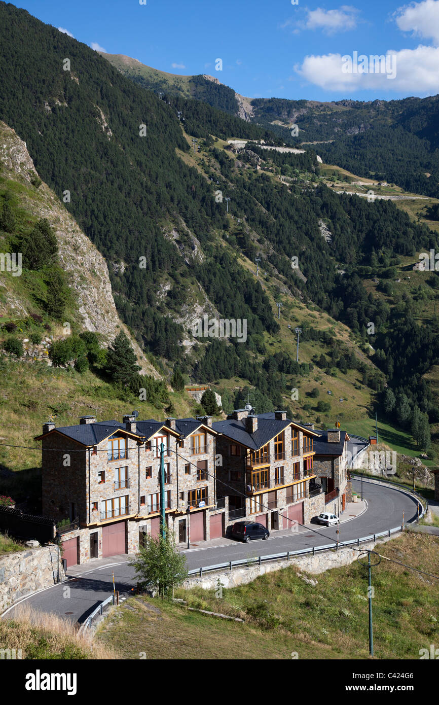 Modern chalet buildings on steep slope among mountains Canillo Andorra ...
