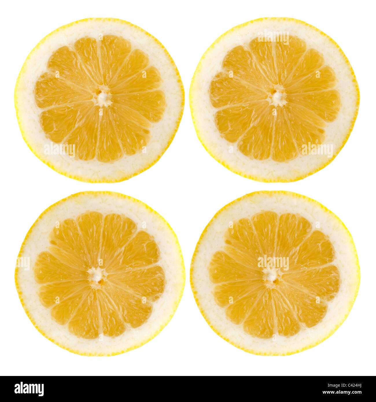 Four fresh lemon halves on white background Stock Photo - Alamy