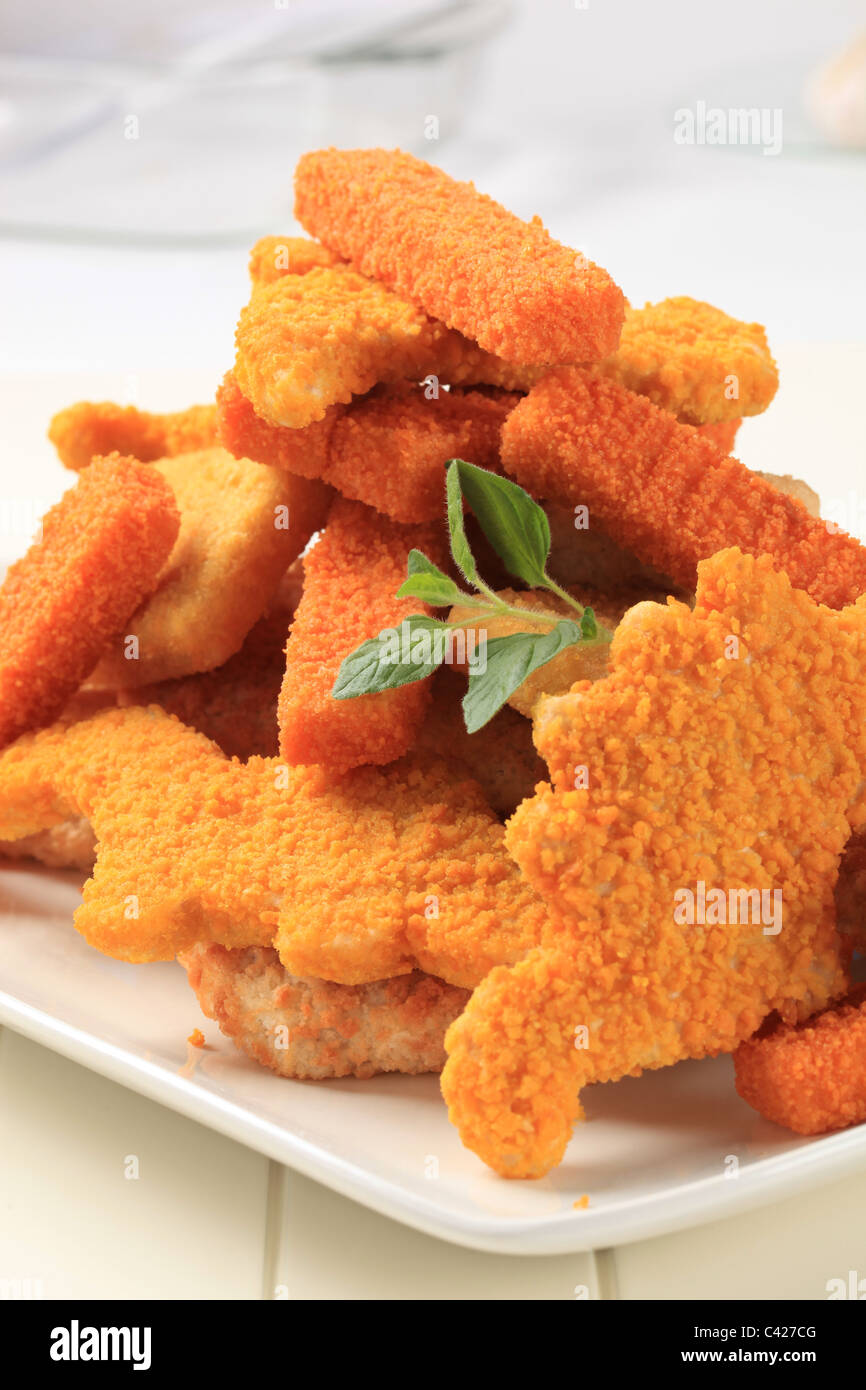 Pieces of fish breaded and deep fried Stock Photo - Alamy