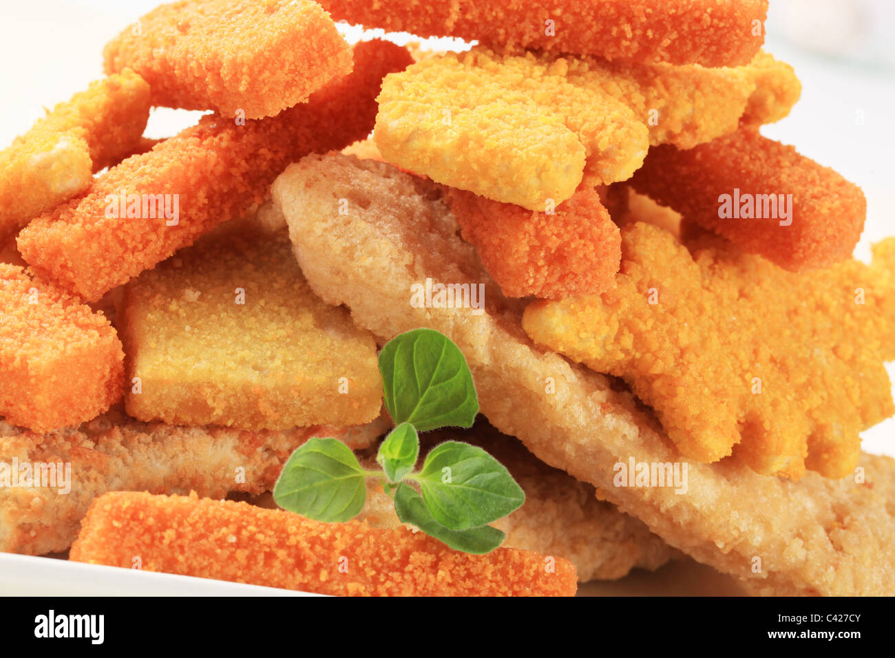 Pieces of fish breaded and deep fried Stock Photo - Alamy