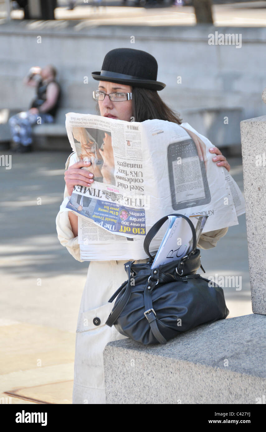 Spies spying girl hiding behind upside down newspaper espionage secret ...