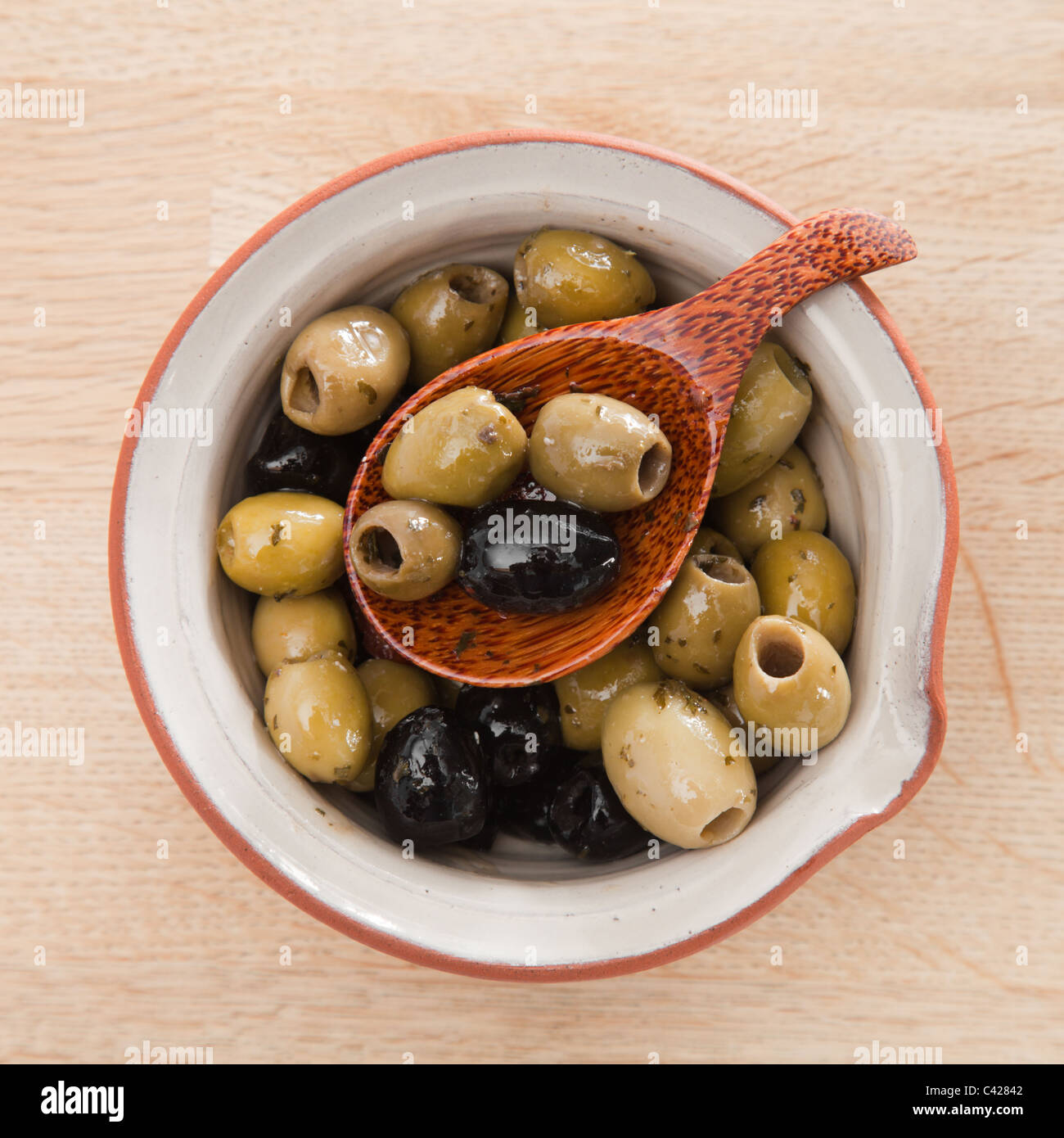olives in a small bowl Stock Photo - Alamy