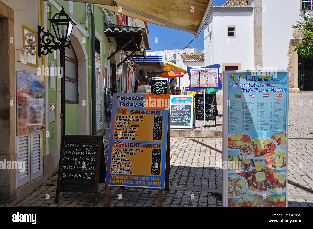 Restaurant signs, Praca Miguel Bombarda, Old Town, Albufeira, Algarve ...