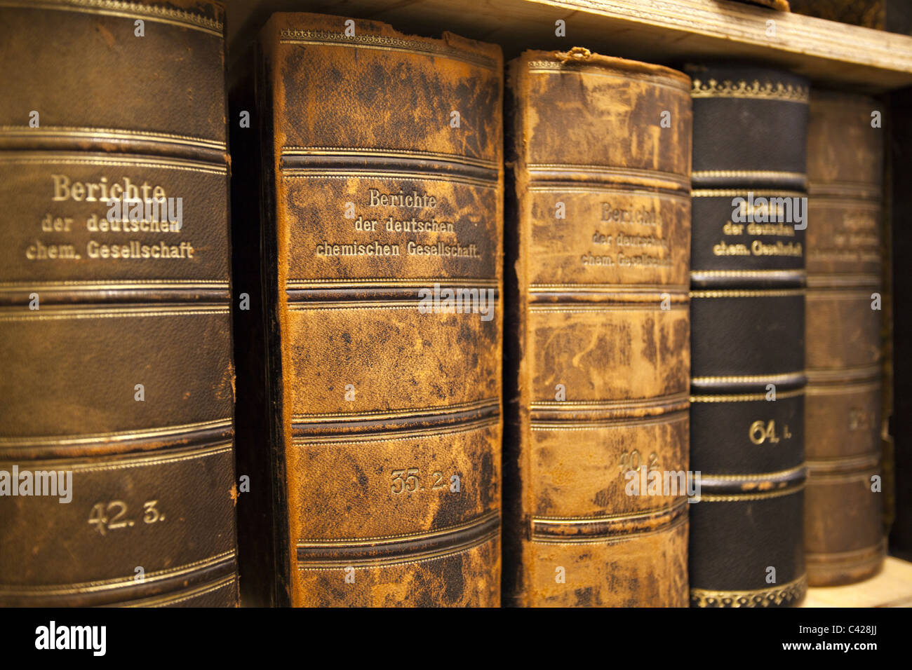 historic old books in line Stock Photo - Alamy