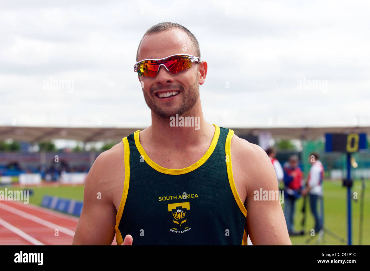 oscar pistorius smiling after winning at the paralympic world cup in ...