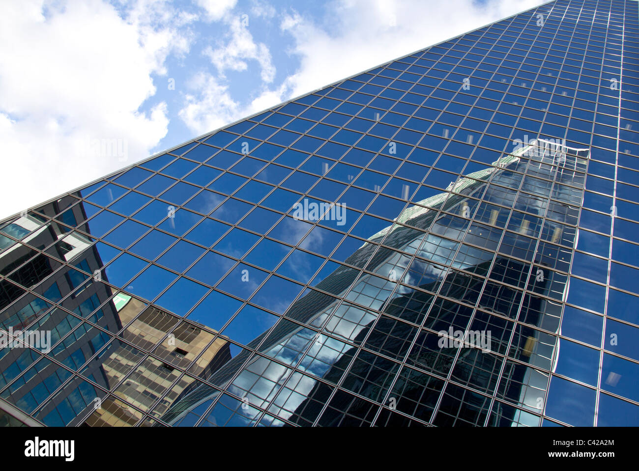 Cloud reflection on glass building hi-res stock photography and images ...