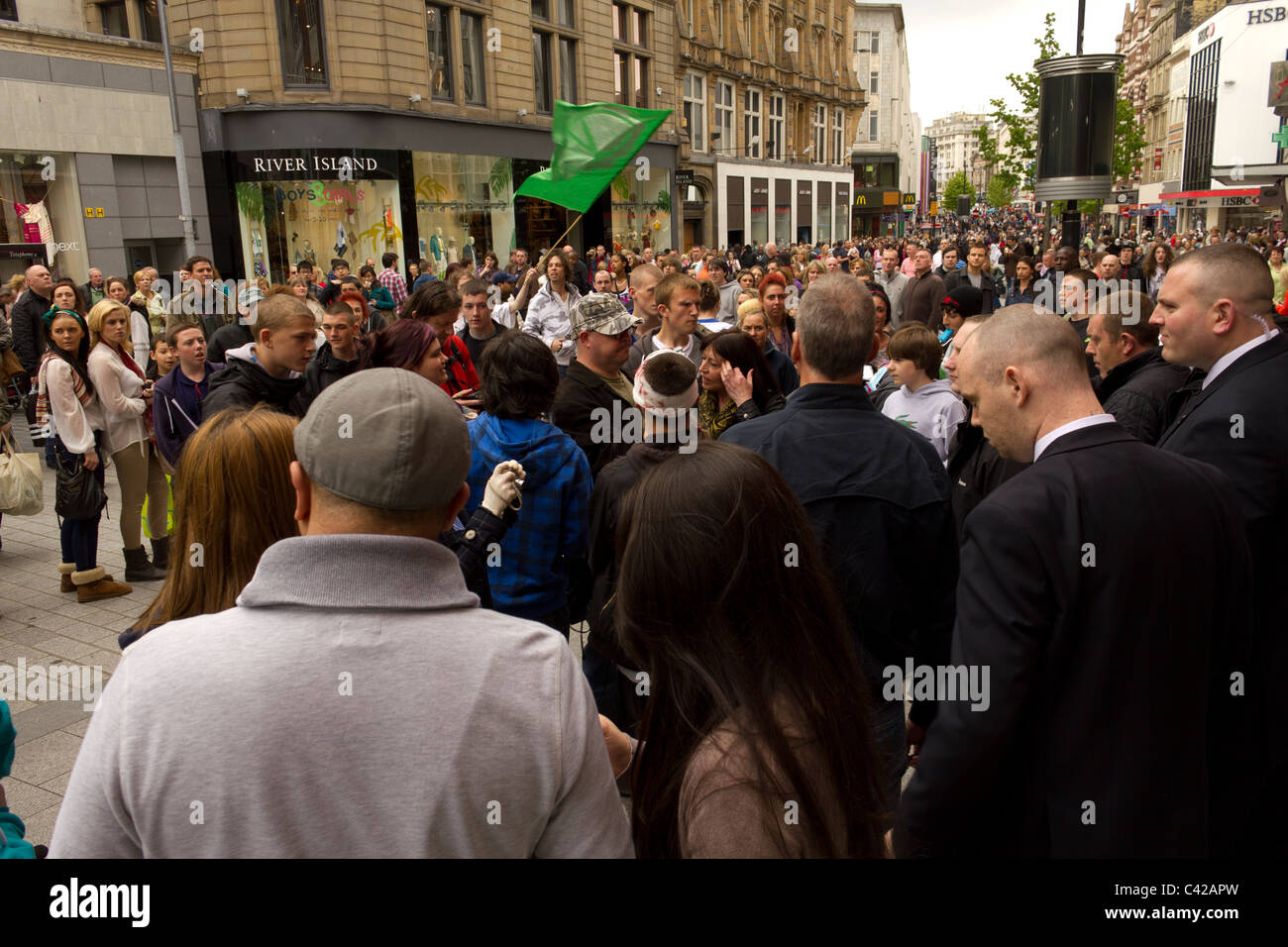 UK Uncut protesters assemble outside a Liverpool Vodafone store in a ...
