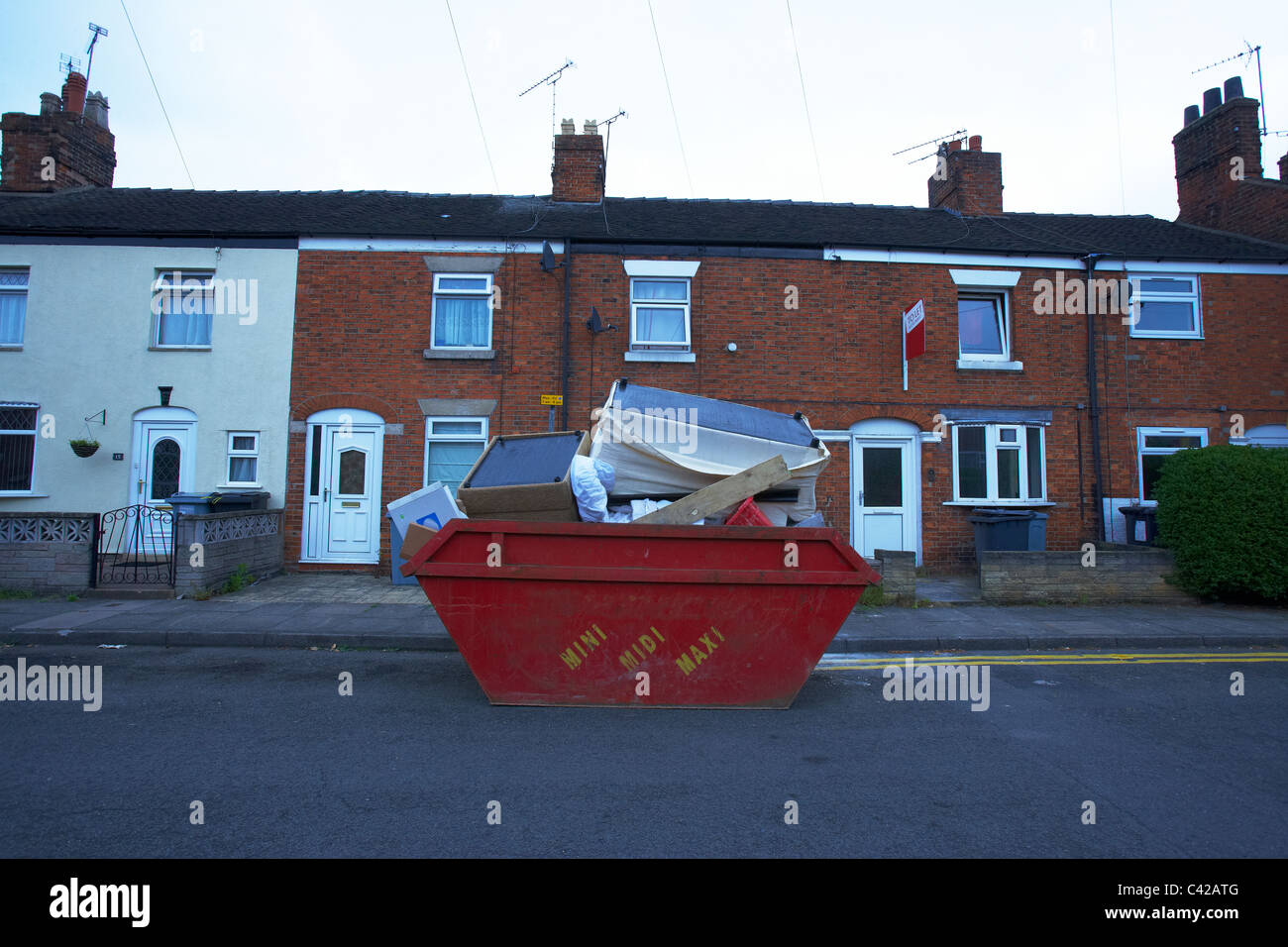 Overloaded skip hi-res stock photography and images - Alamy