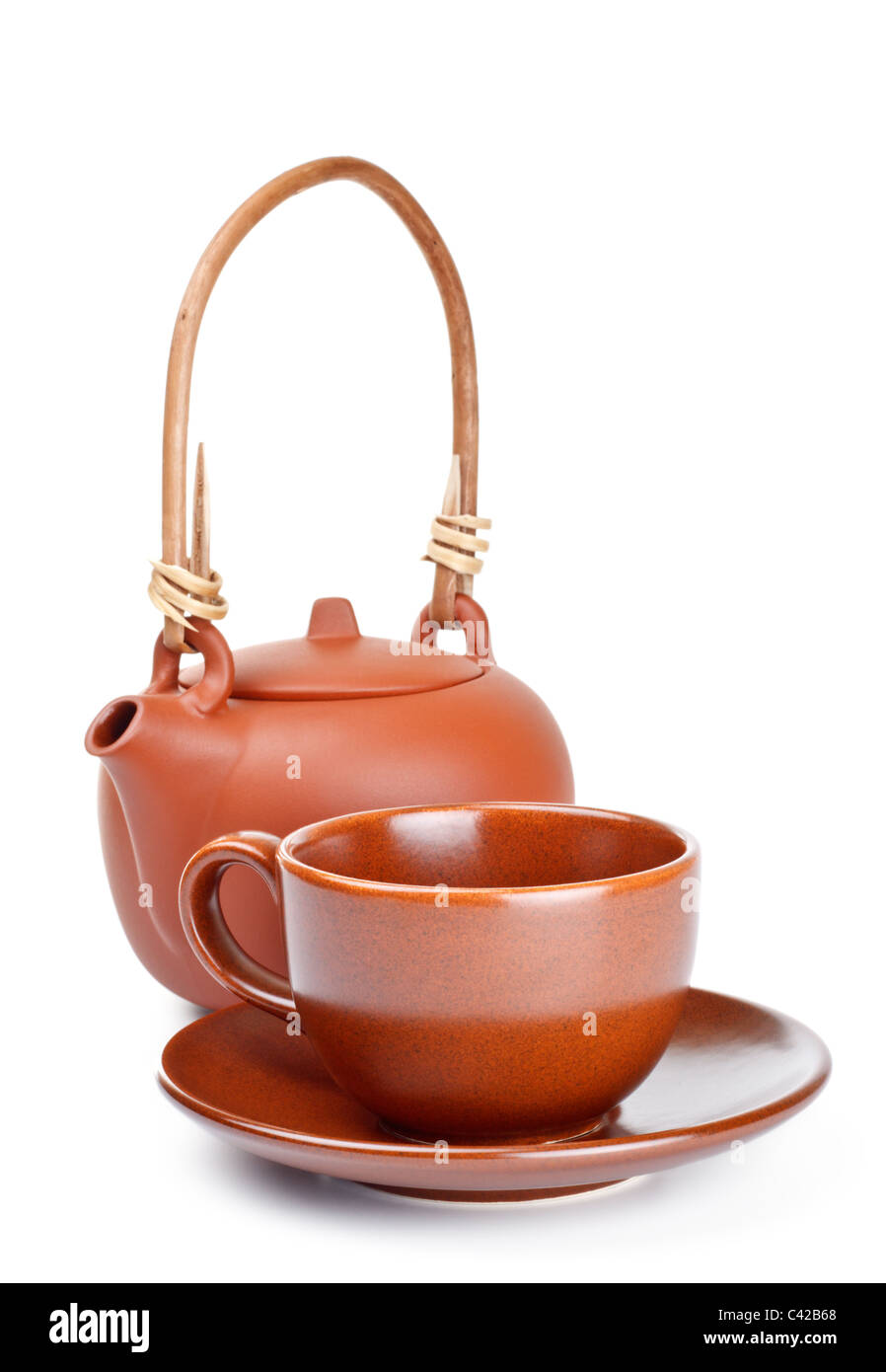 clay kettle and cup isolated on white Stock Photo - Alamy