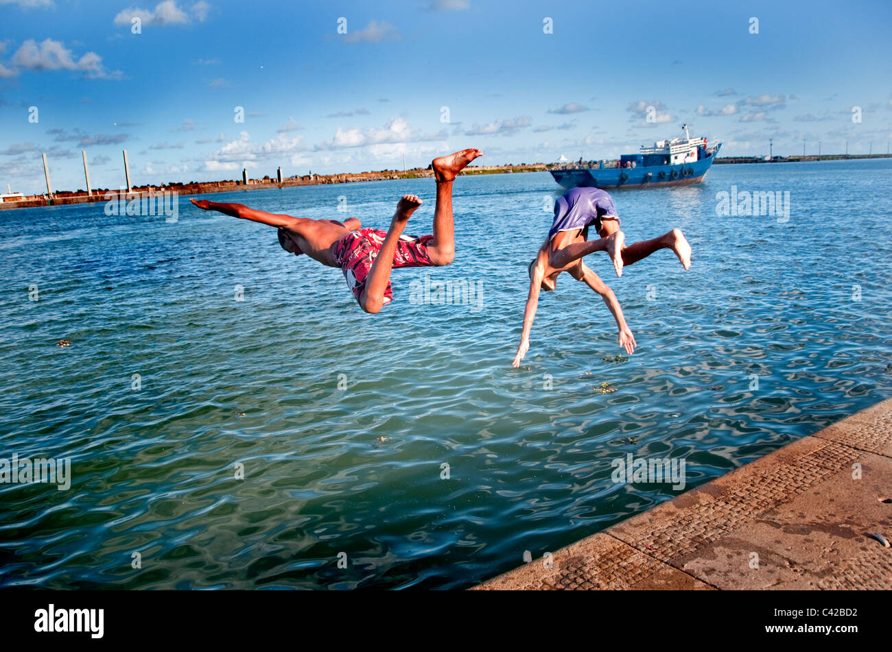 Boys diving pier hi-res stock photography and images - Alamy
