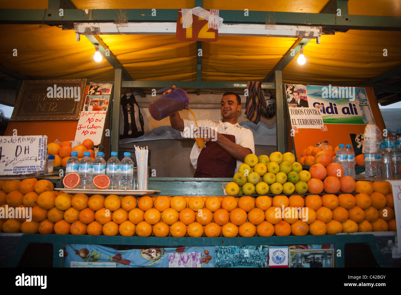 Juice seller at at Place Jemaa al-Fna Stock Photo - Alamy