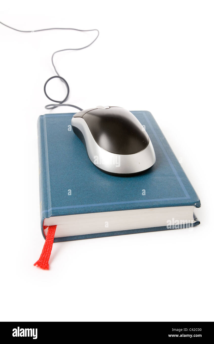 computer mouse and book, concept of online education Stock Photo - Alamy