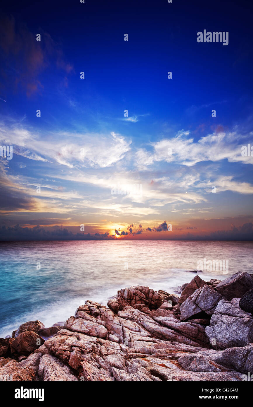 Sunset over the tropical sea. Long exposure shot Stock Photo - Alamy