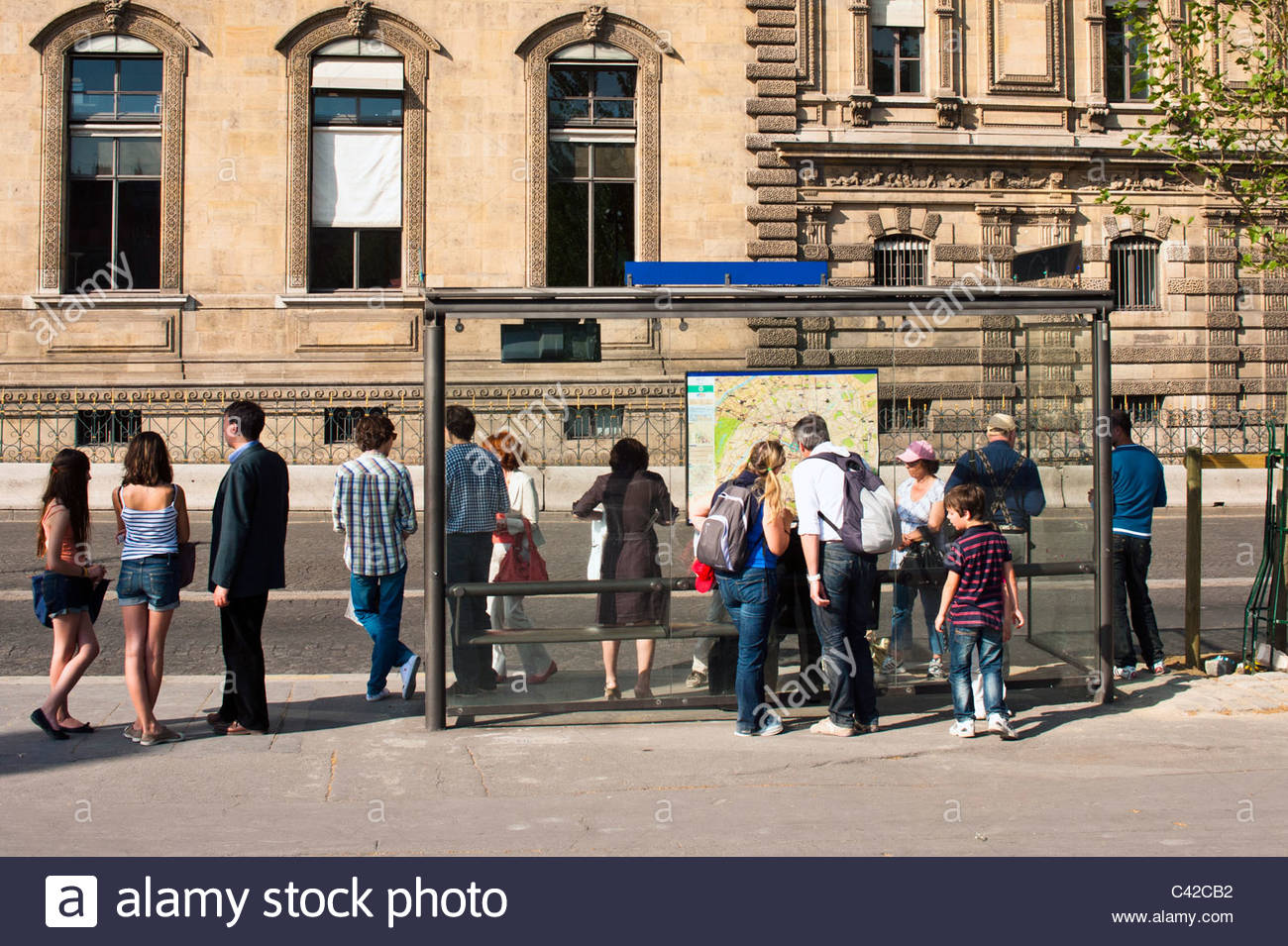 Queue People Waiting Bus Stop Stock Photos & Queue People Waiting Bus Stop Stock Images - Alamy