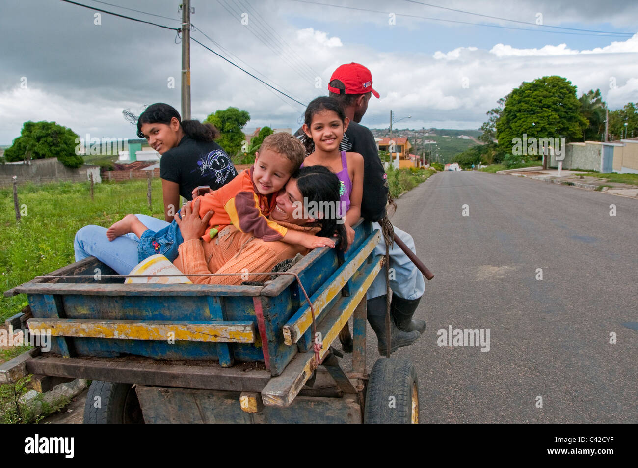 Family riding on horse drawn cart in Northeastern Brazil Stock Photo ...