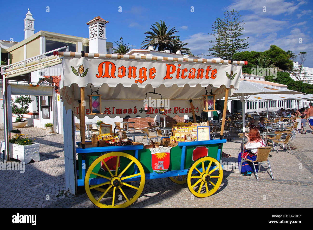 Almond snack cart on beachfront, Praia da Oura, Faro District, Algarve ...