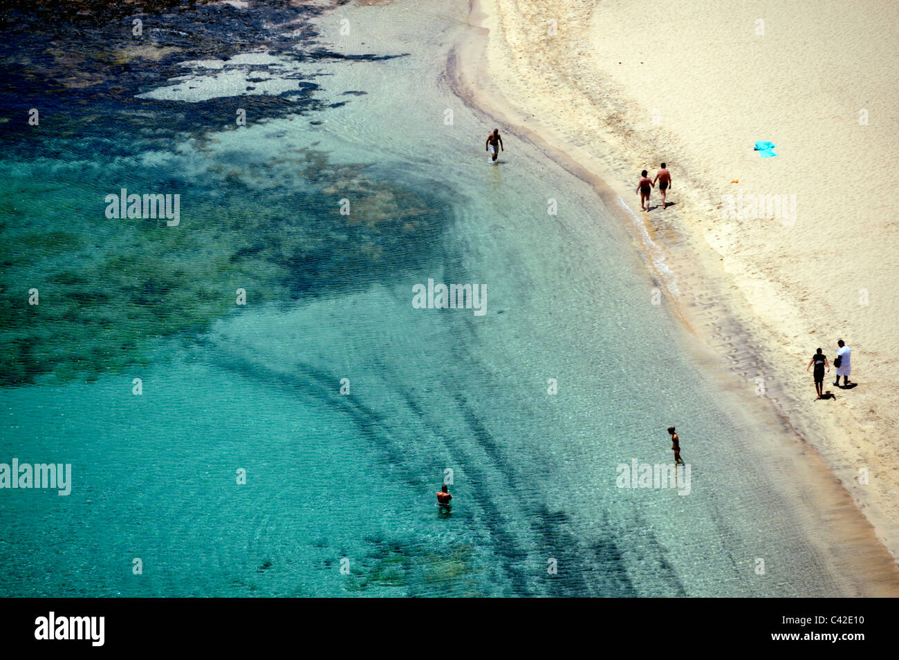 Looking down on white sand beach and sea Stock Photo - Alamy