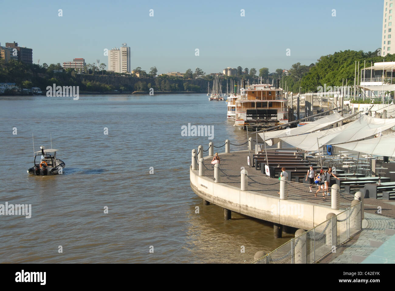 Brisbane river at the Riverside precinct bordered with cafés, bars, and ...