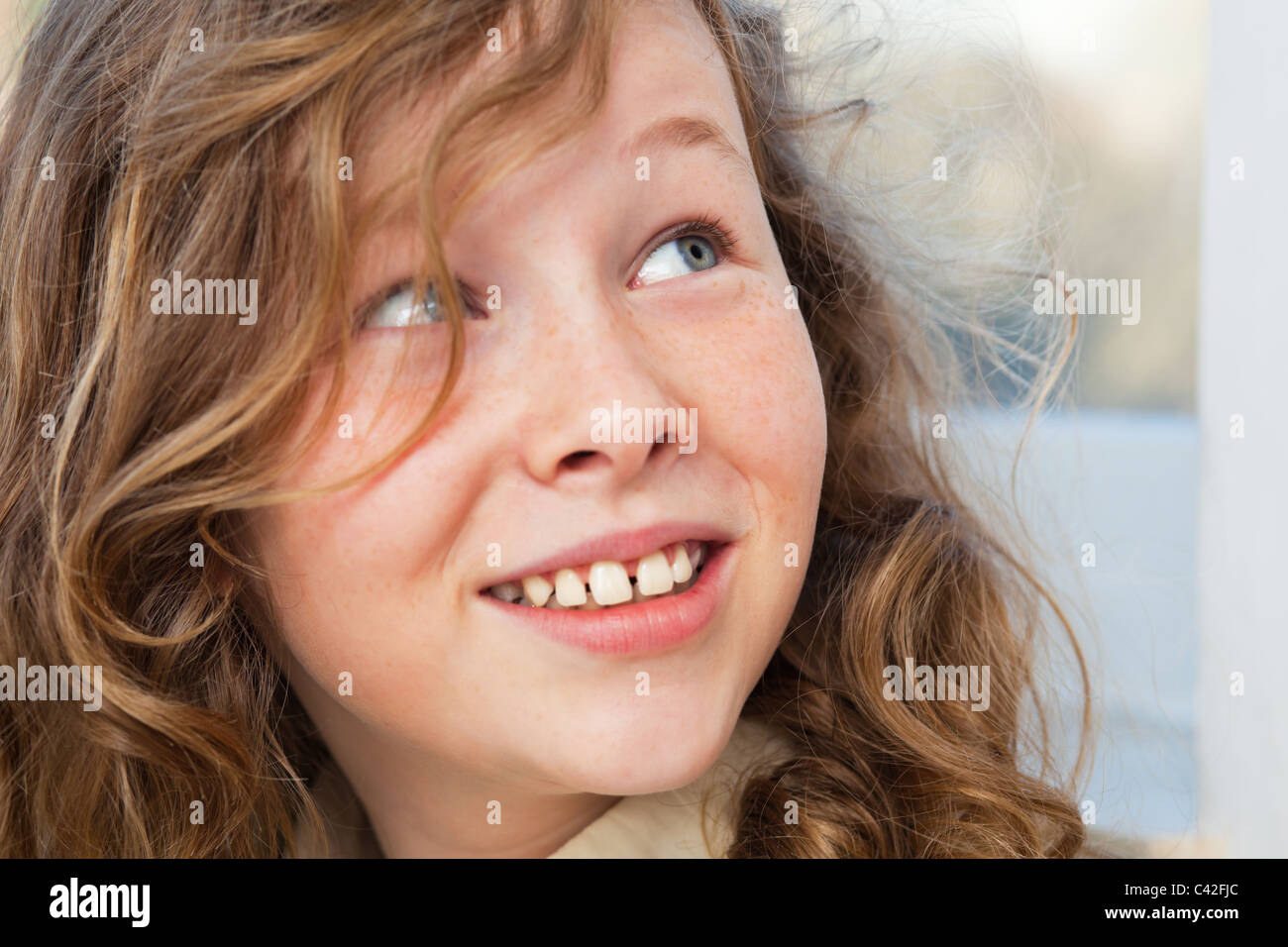 Closeup portrait of a cute teenager girl turning back Stock Photo - Alamy