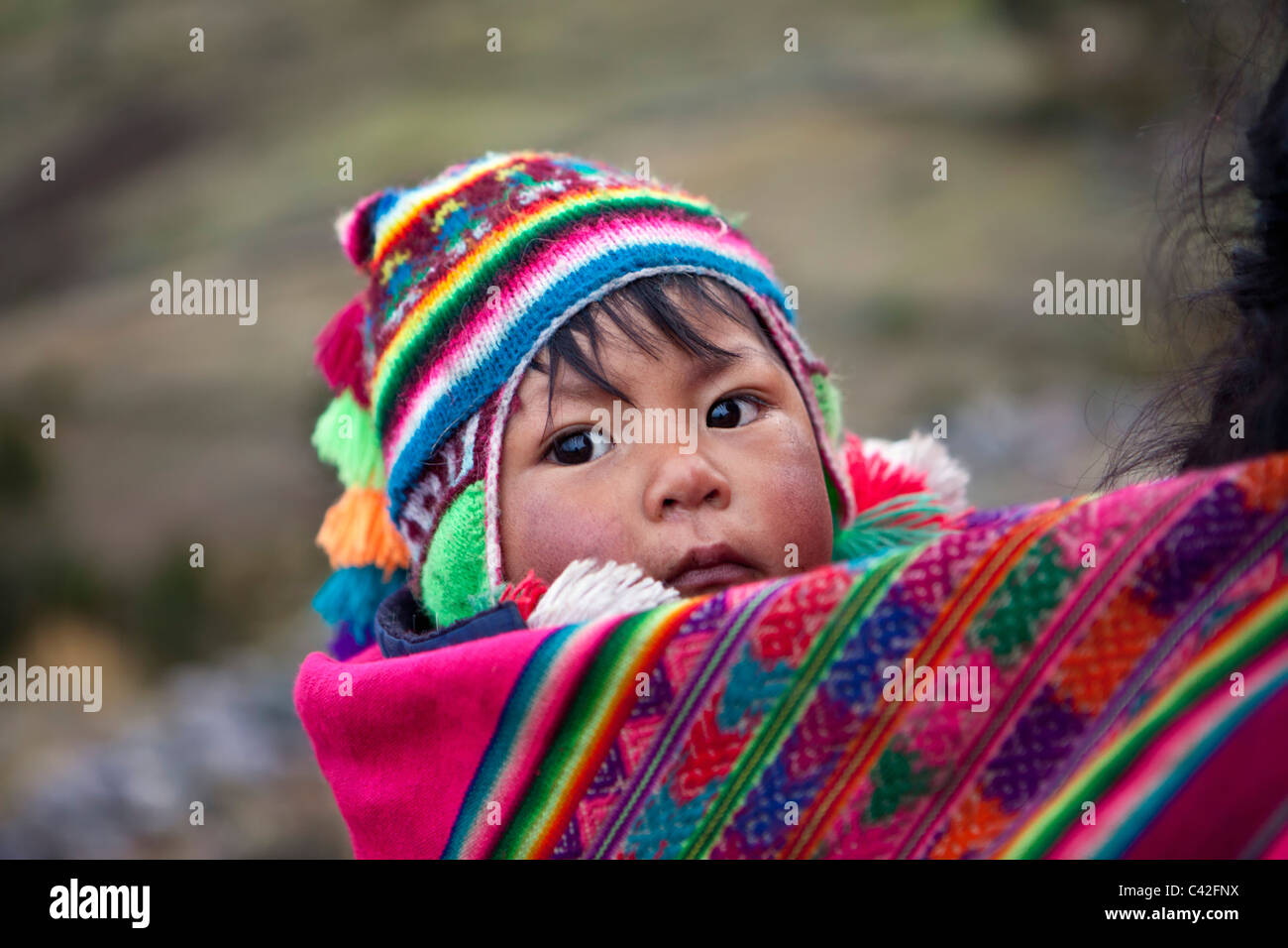 Peru, Patakancha, Patacancha, village near Ollantaytambo. Indian baby ...
