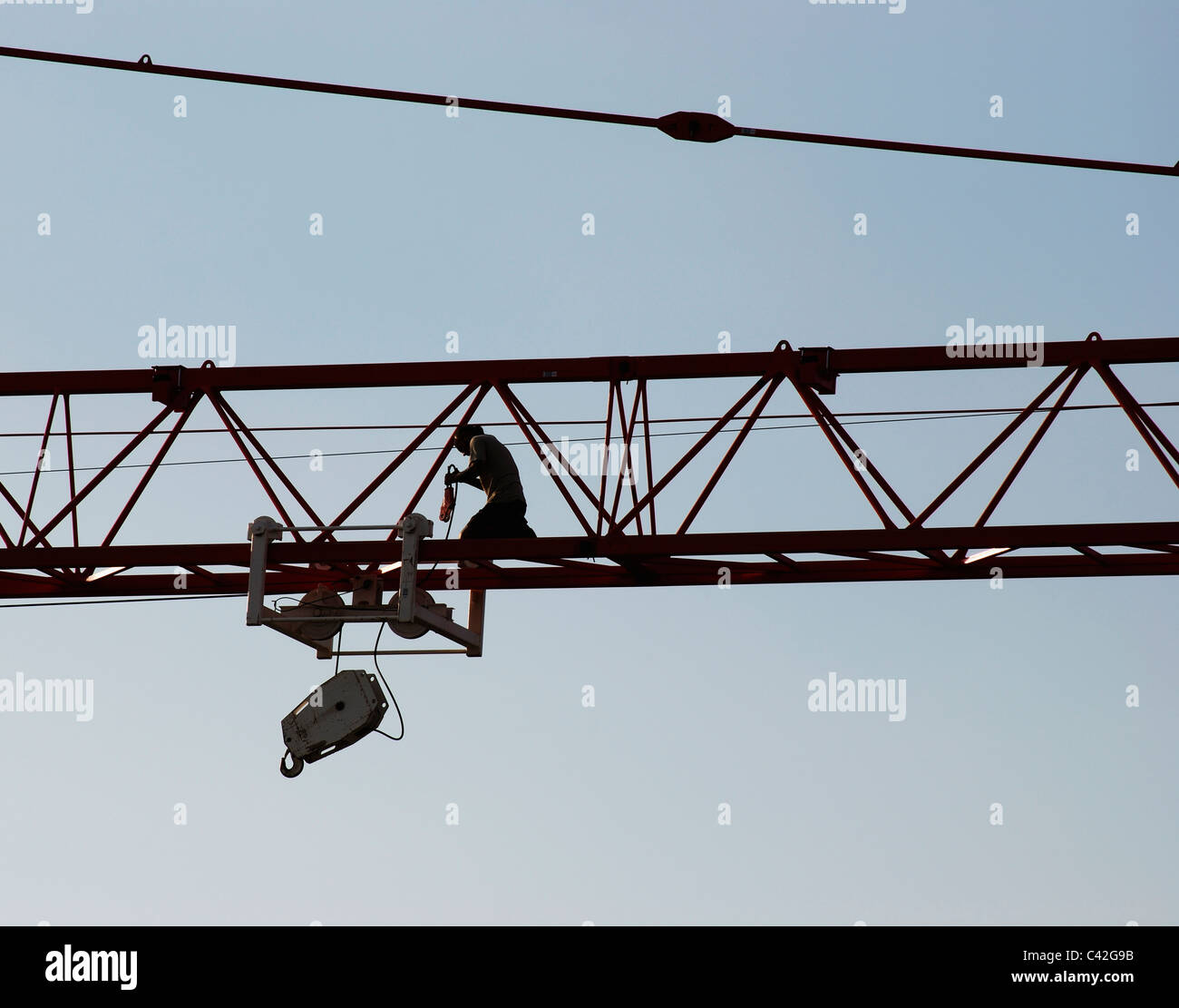 Man sitting on crane hi-res stock photography and images - Alamy