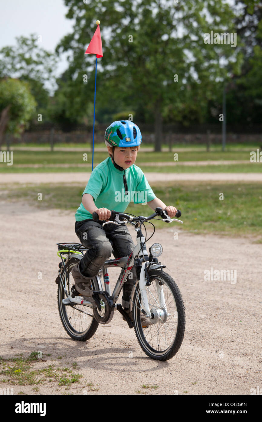 young boy cycling Stock Photo - Alamy
