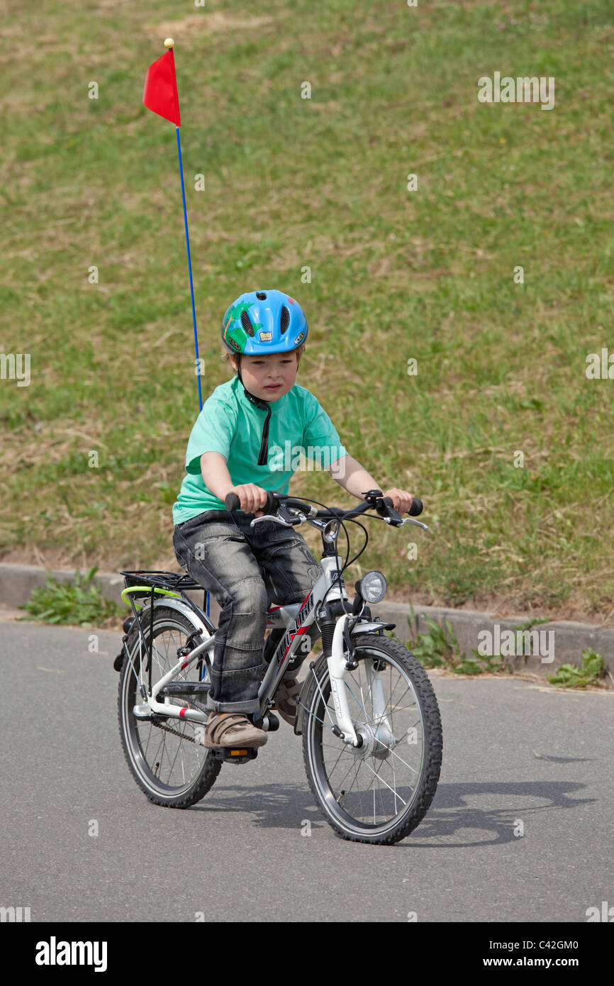 young boy cycling Stock Photo - Alamy