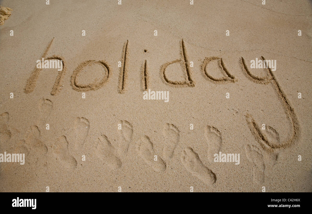 Holiday Writing in the Sand Stock Photo - Alamy