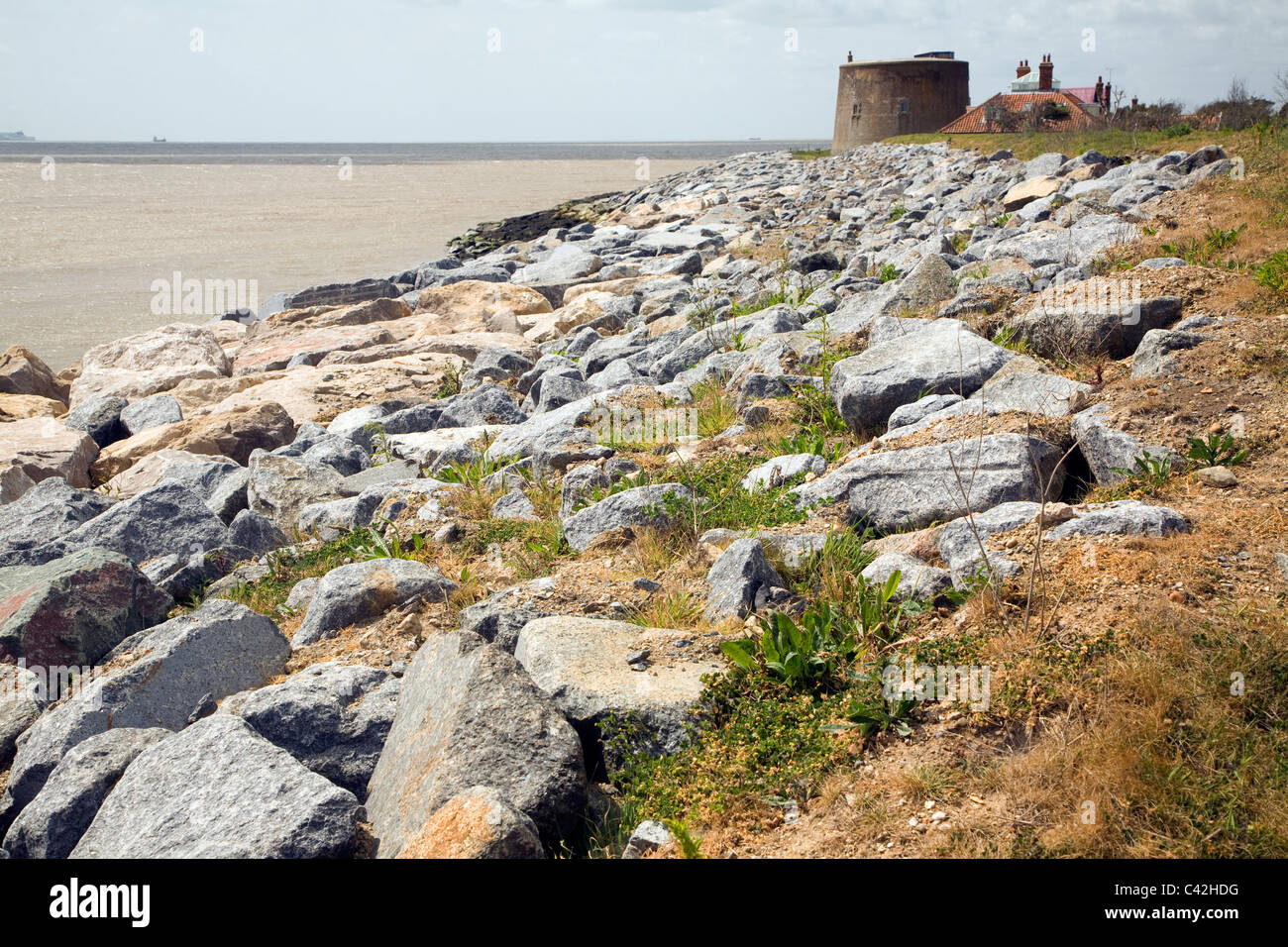 Rock armour coastal defences protect the martello tower East Lane ...