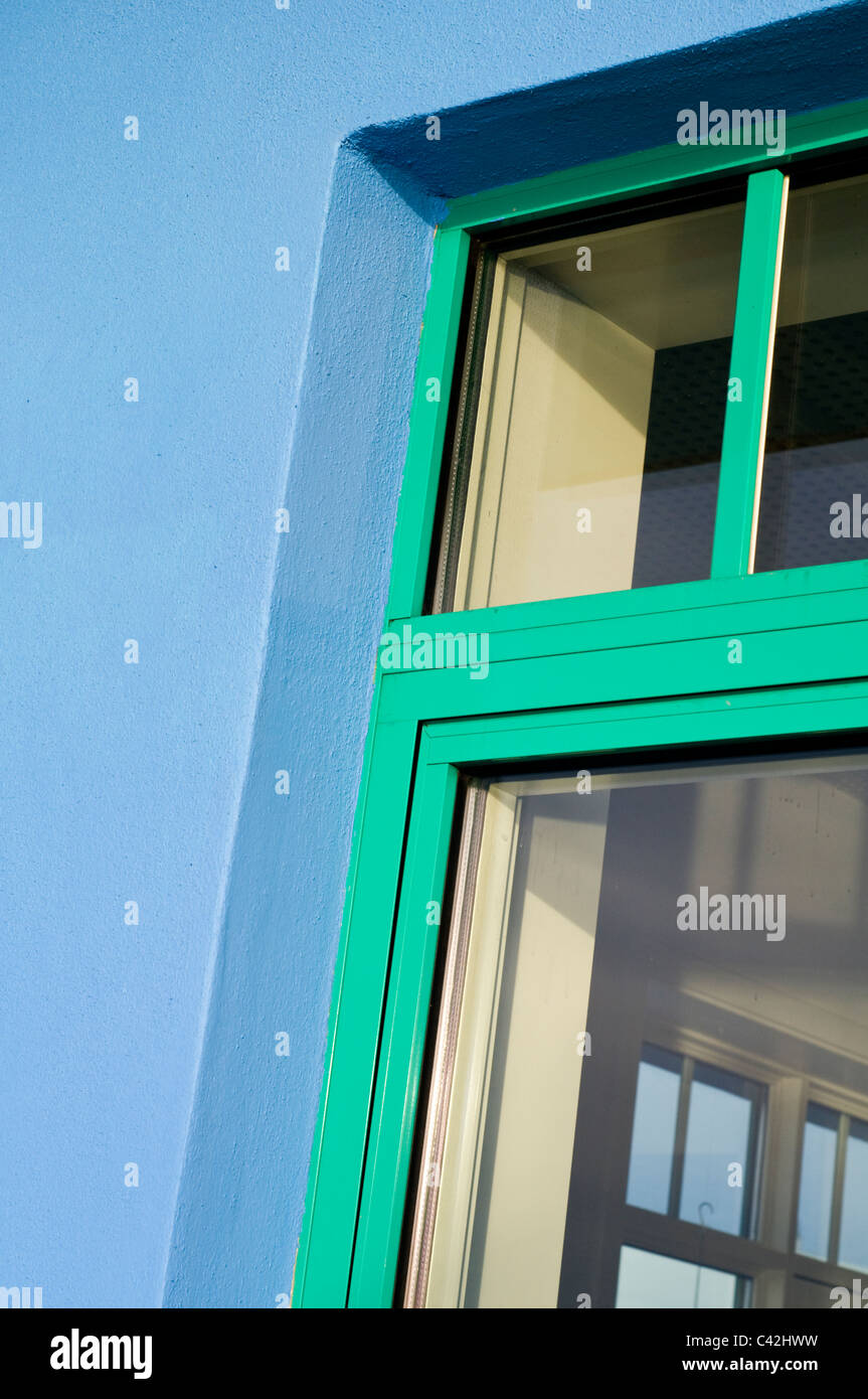 The window frame and exterior blue wall of a building in the town of ...
