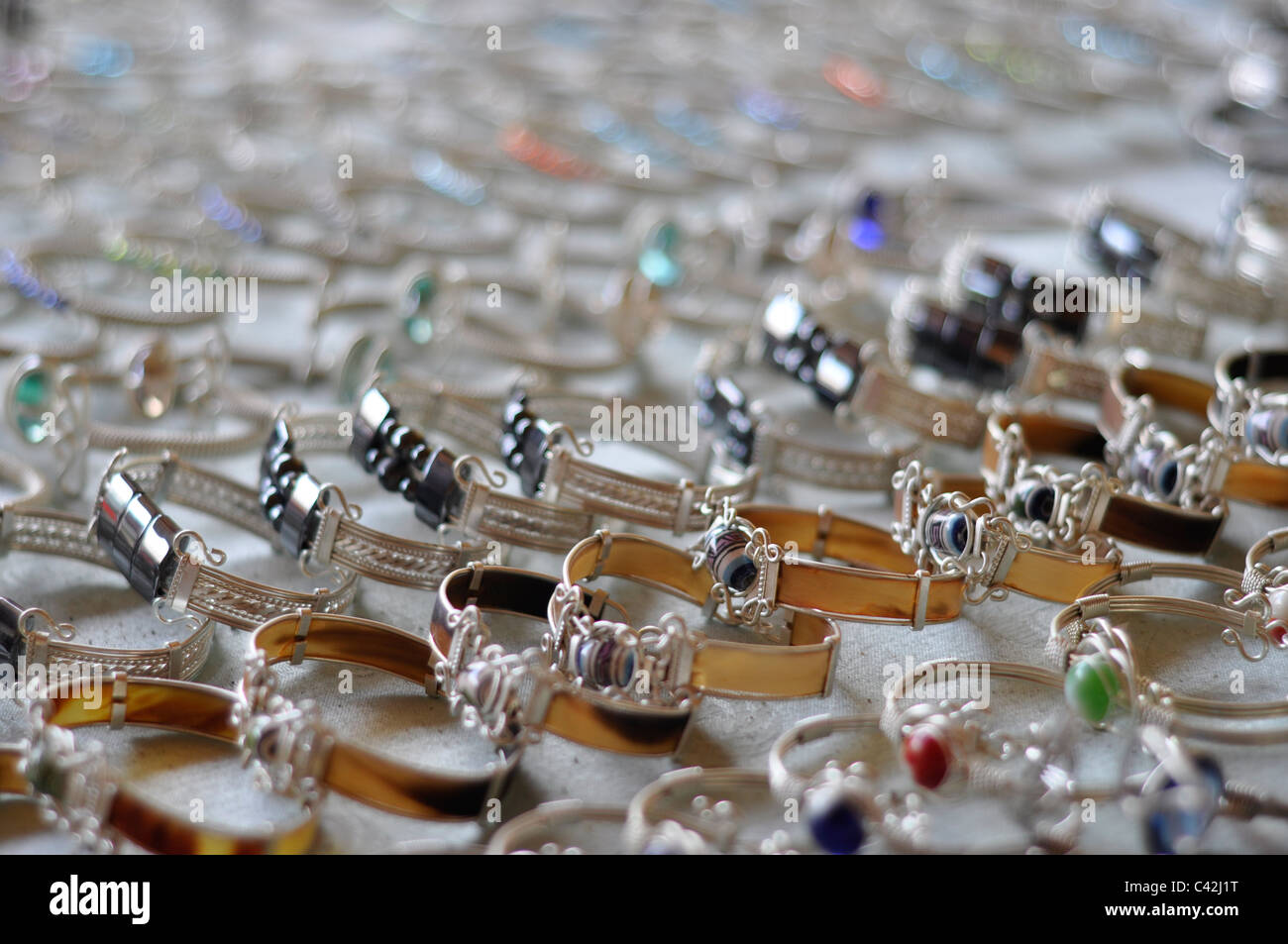 A selection of handmade, crafted Cuban silver and gold, precious stone ...