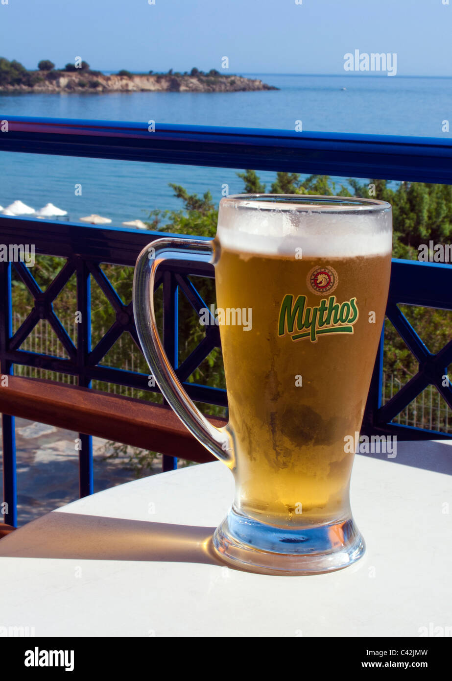 MYTHOS BEER IN A GREEK SEASIDE TAVERNA Stock Photo - Alamy