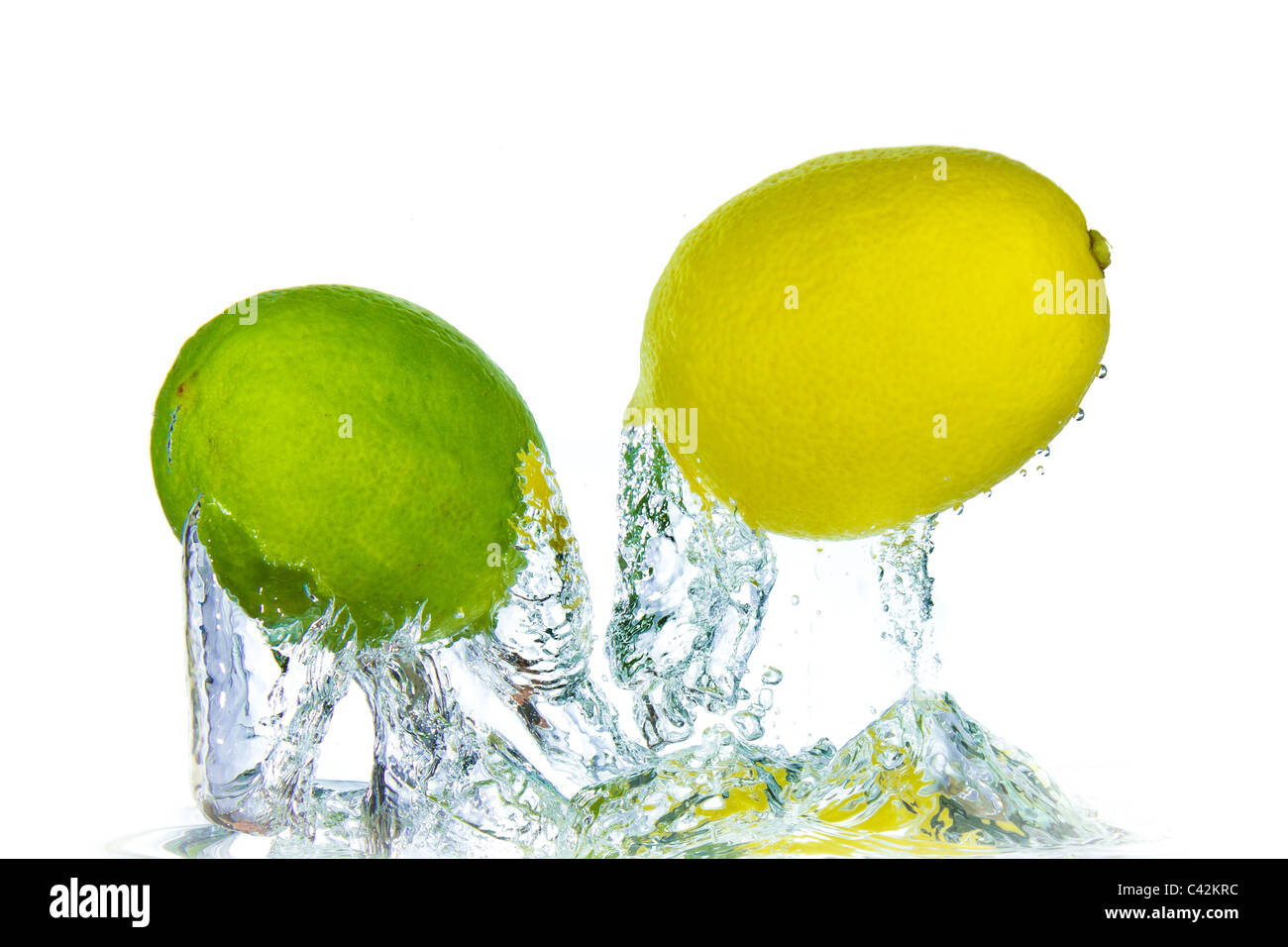 lime and lemon splashing water isolated on white background Stock Photo ...