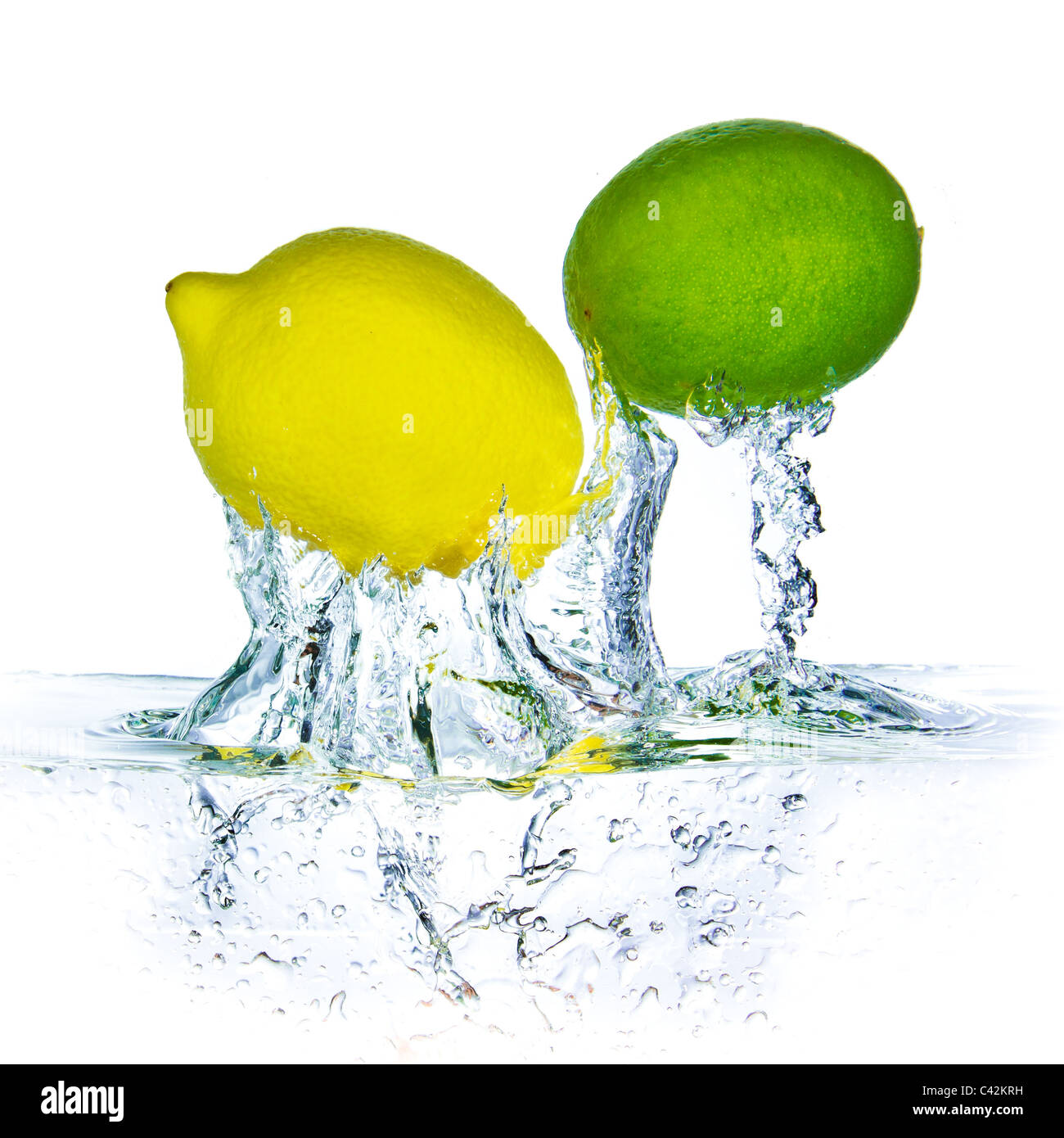 lime and lemon splashing water isolated on white background Stock Photo ...