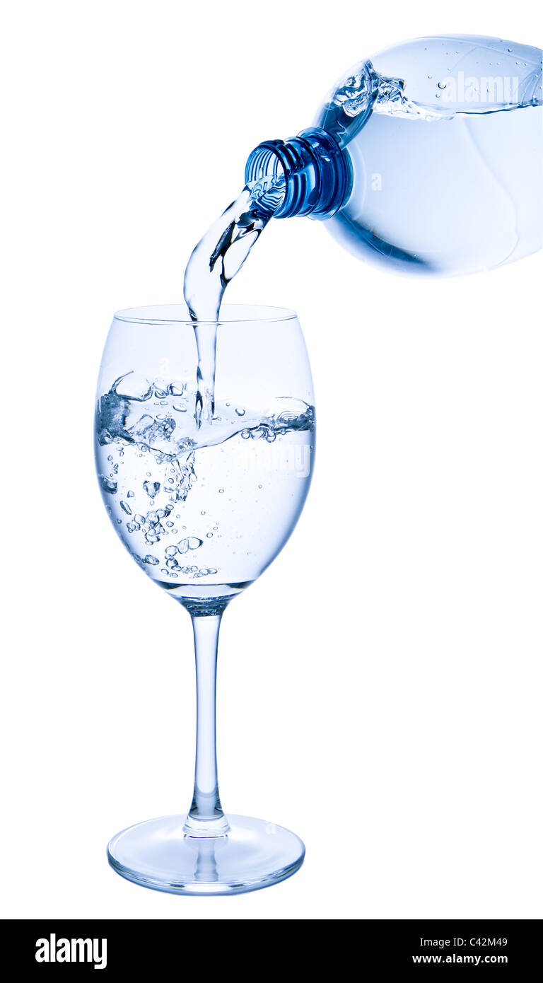water pouring into glass on white background Stock Photo - Alamy