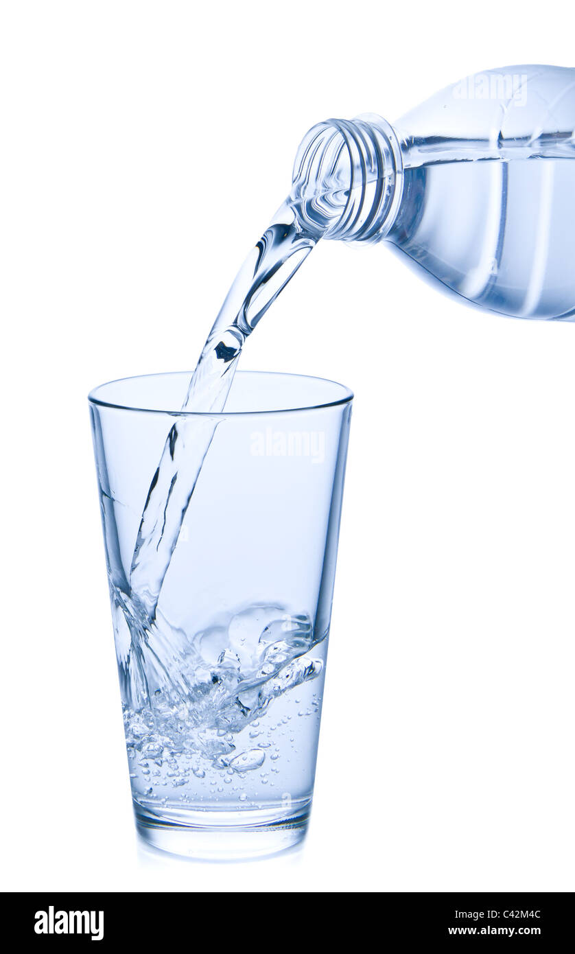 water pouring into glass on white background Stock Photo - Alamy