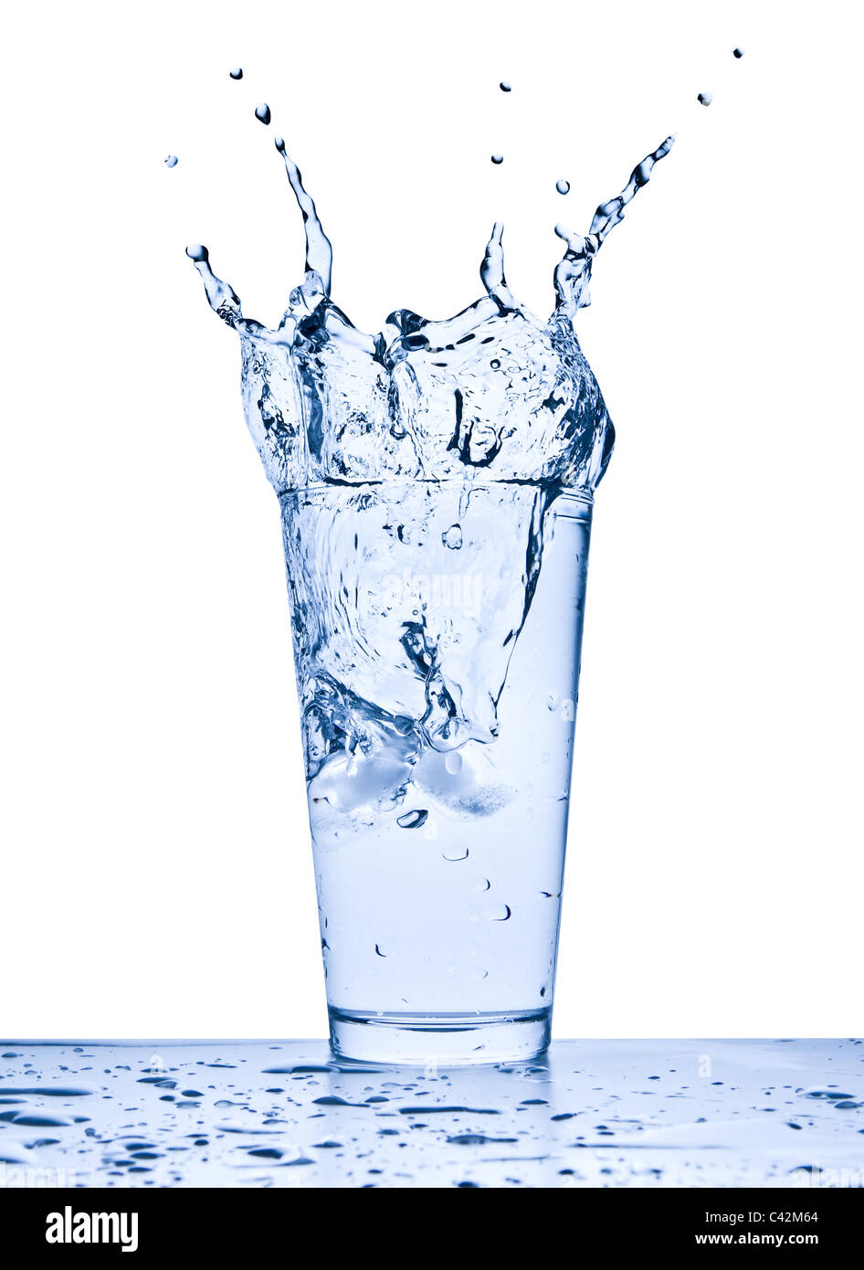 water splashing from glass isolated on white background Stock Photo - Alamy