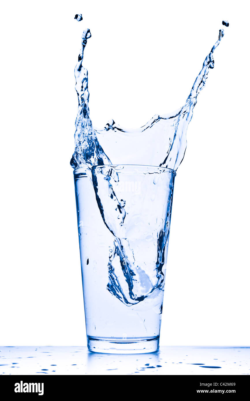 water splashing from glass isolated on white background Stock Photo - Alamy