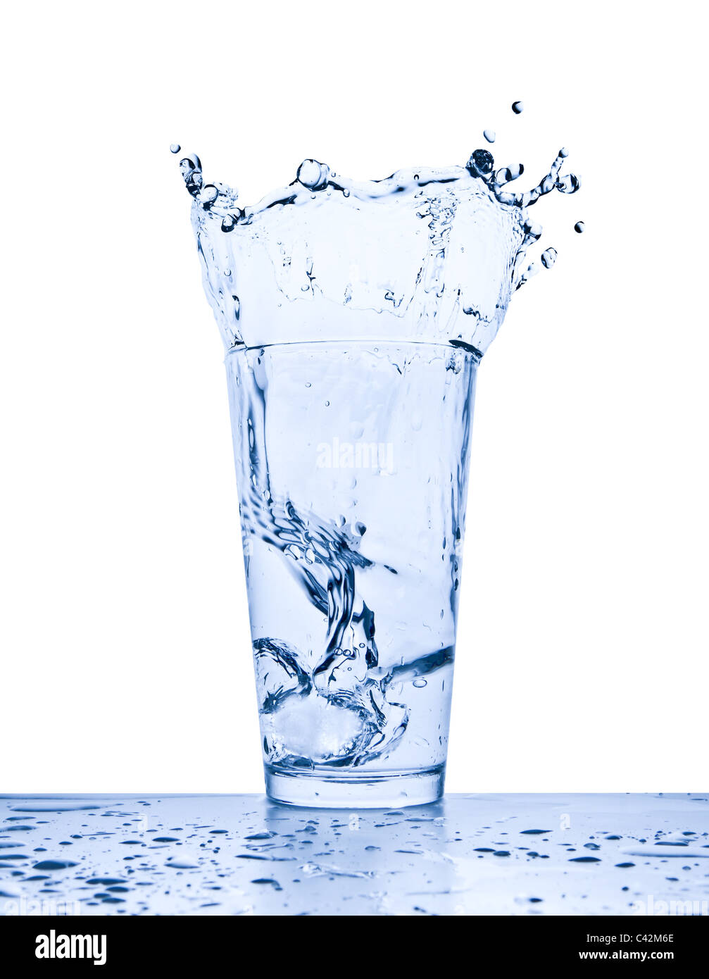 water splashing from glass isolated on white background Stock Photo - Alamy