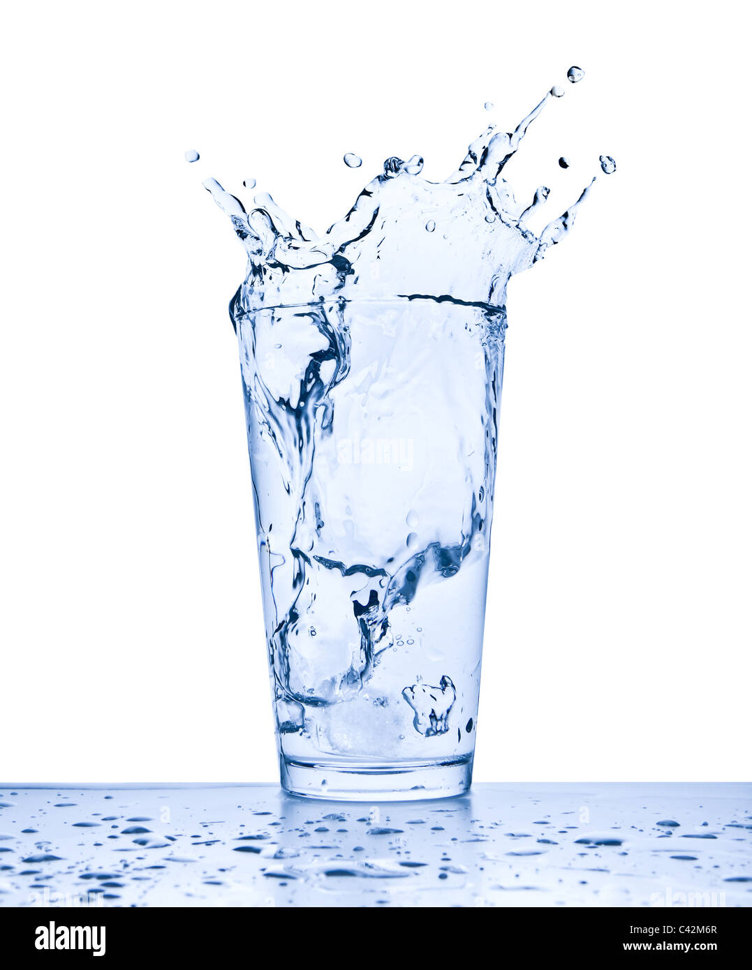 water splashing from glass isolated on white background Stock Photo - Alamy