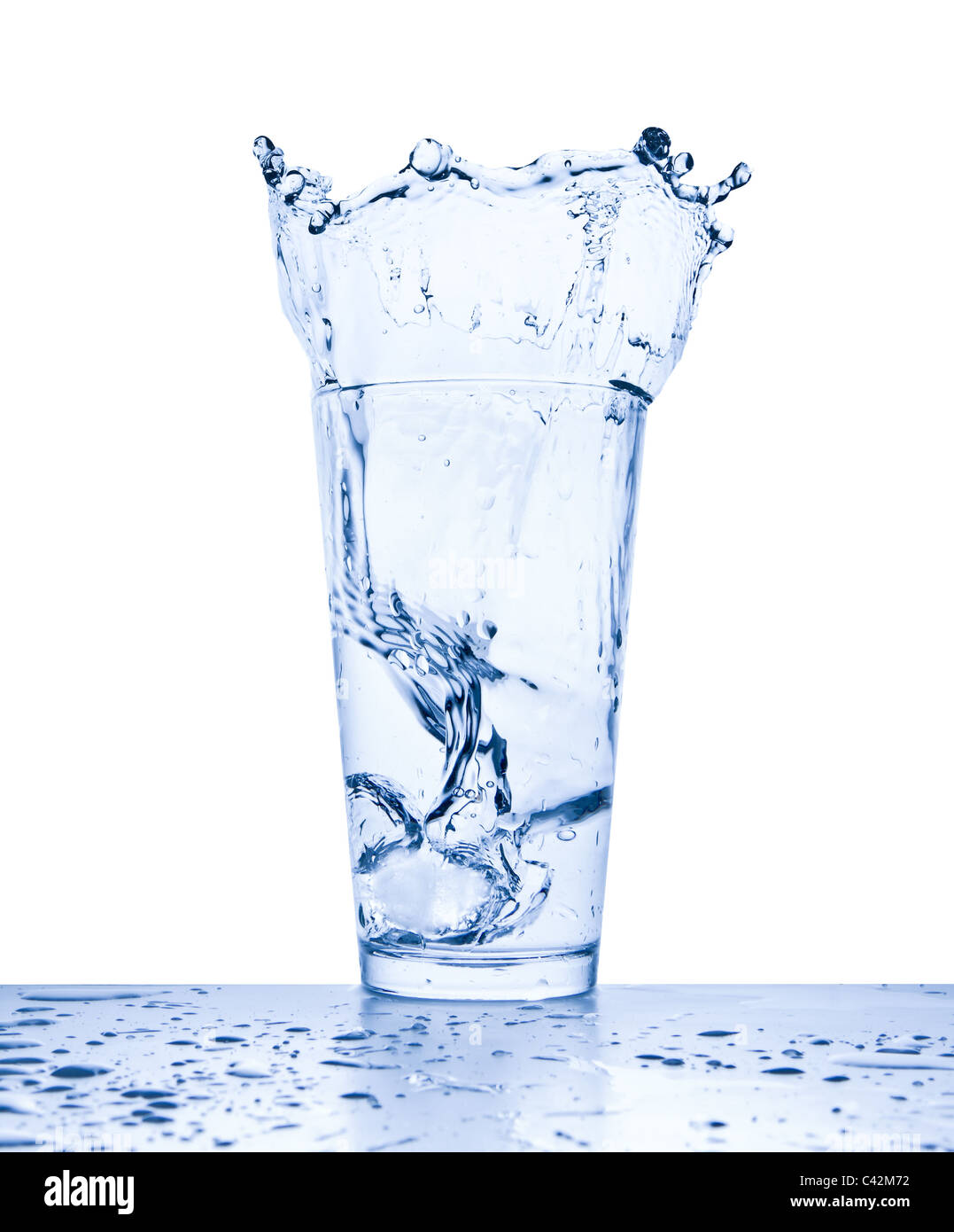 water splashing from glass isolated on white background Stock Photo - Alamy