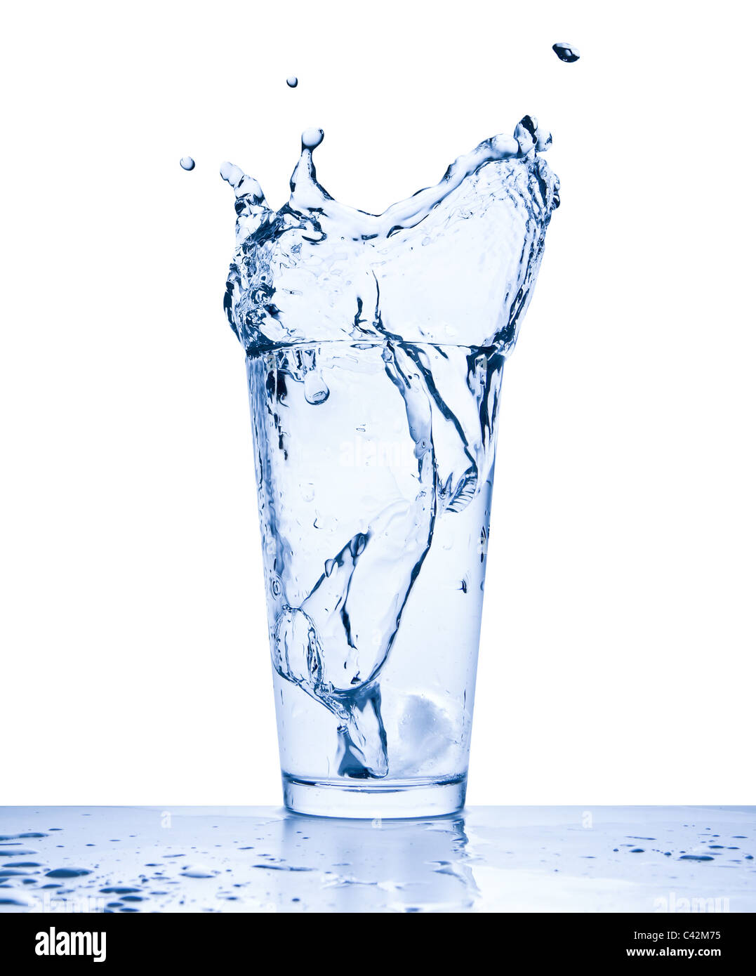 water splashing from glass isolated on white background Stock Photo - Alamy