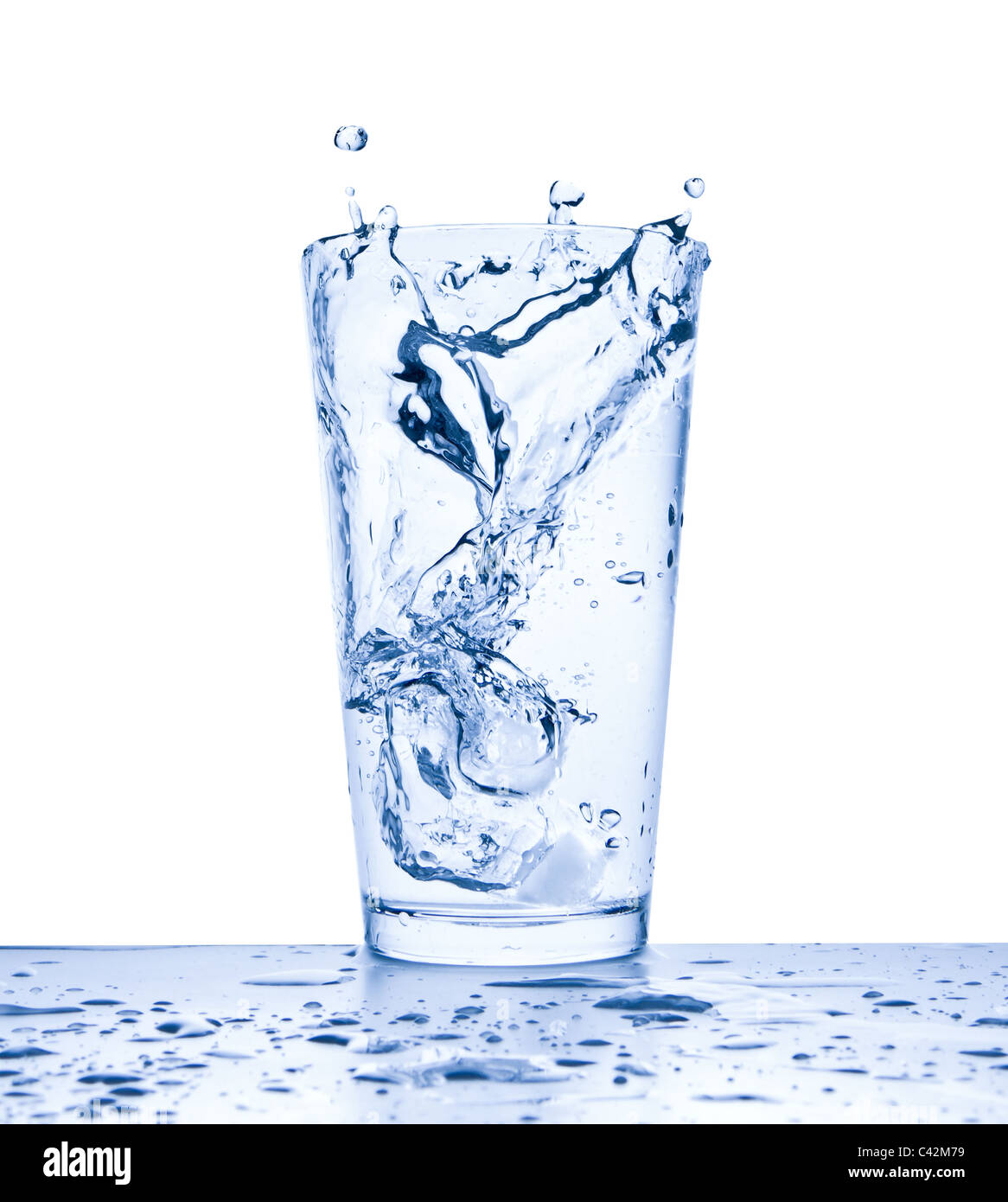water splashing from glass isolated on white background Stock Photo - Alamy