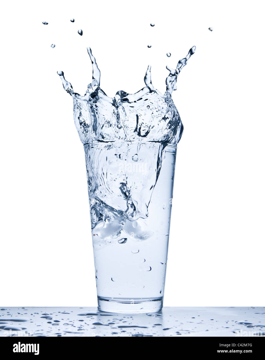 water splashing from glass isolated on white background Stock Photo - Alamy