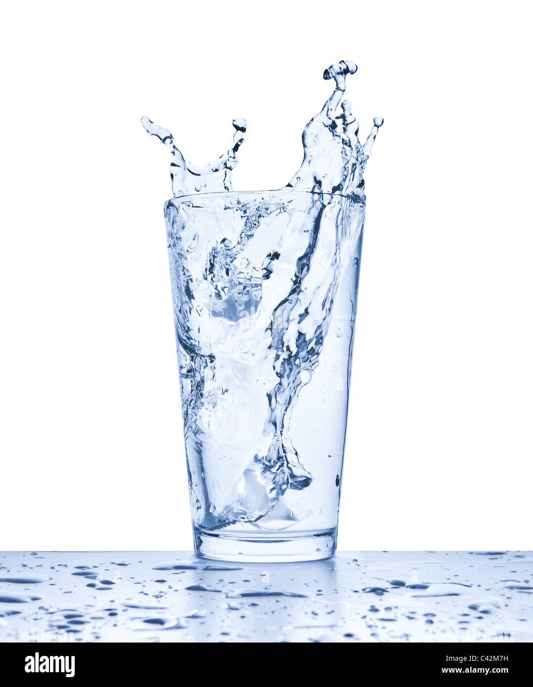 water splashing from glass isolated on white background Stock Photo - Alamy